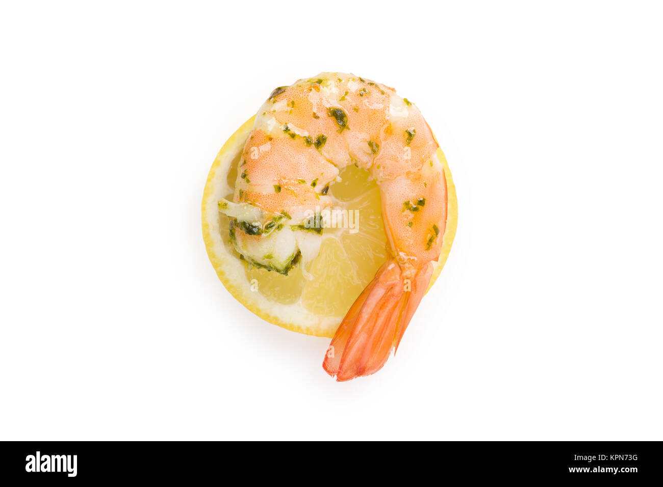 Cooked shrimp on lemon slice on white background top view. Culinary ...