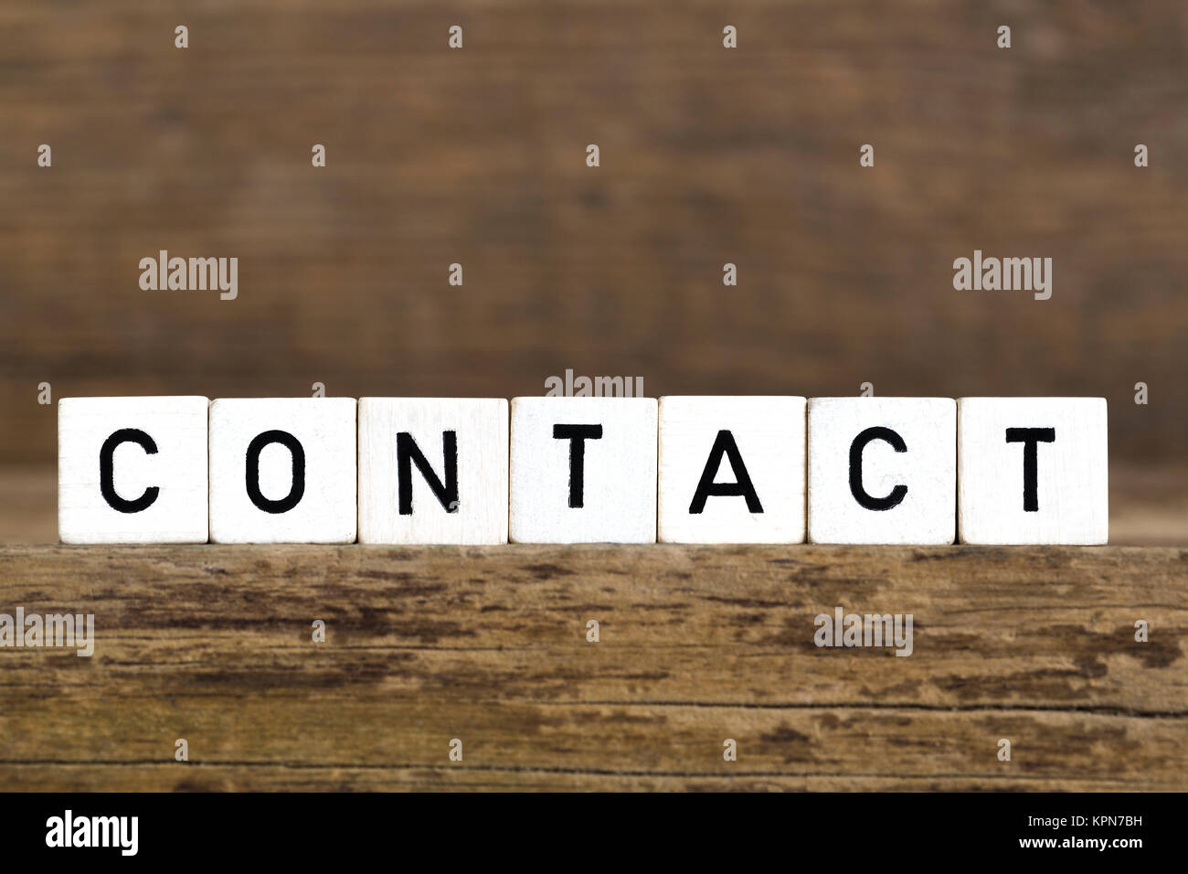 The word contact written in cubes Stock Photo - Alamy