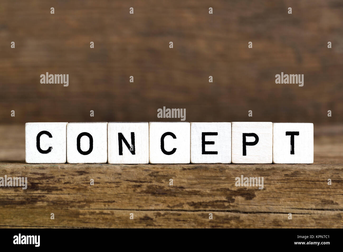 The word concept written in cubes Stock Photo - Alamy