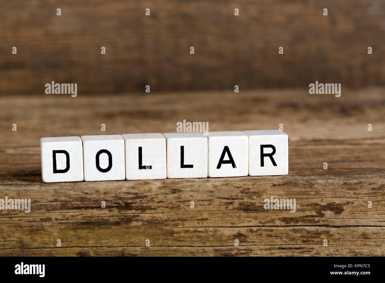 The word dollar written in cubes Stock Photo - Alamy