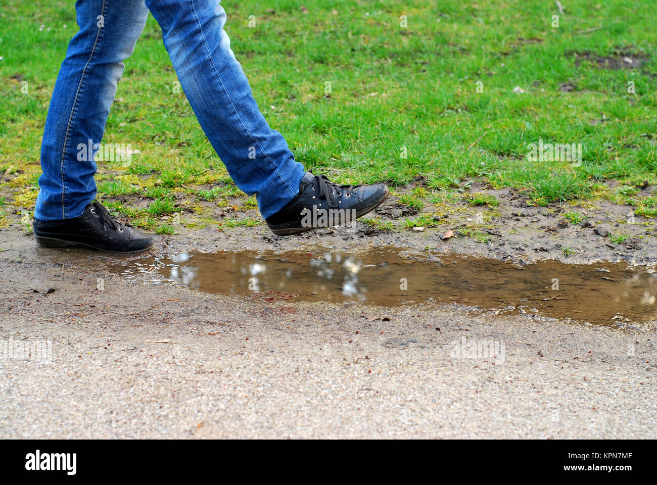 step in a puddle of water Stock Photo - Alamy