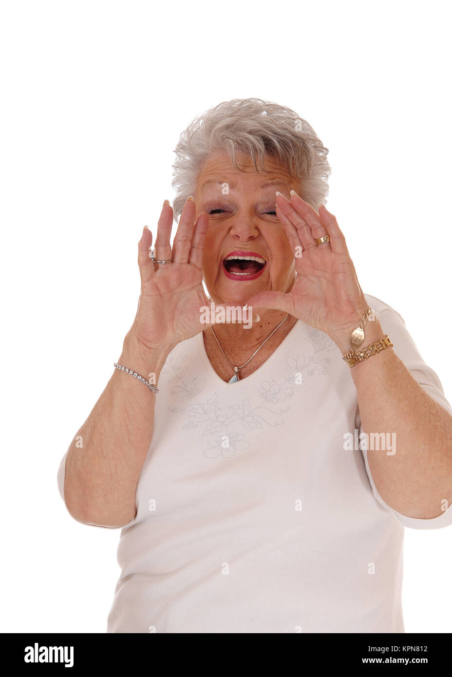 Senior woman shouting Stock Photo - Alamy
