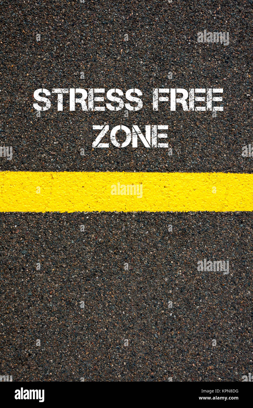 Road marking yellow line words STRESS FREE ZONE Stock Photo - Alamy