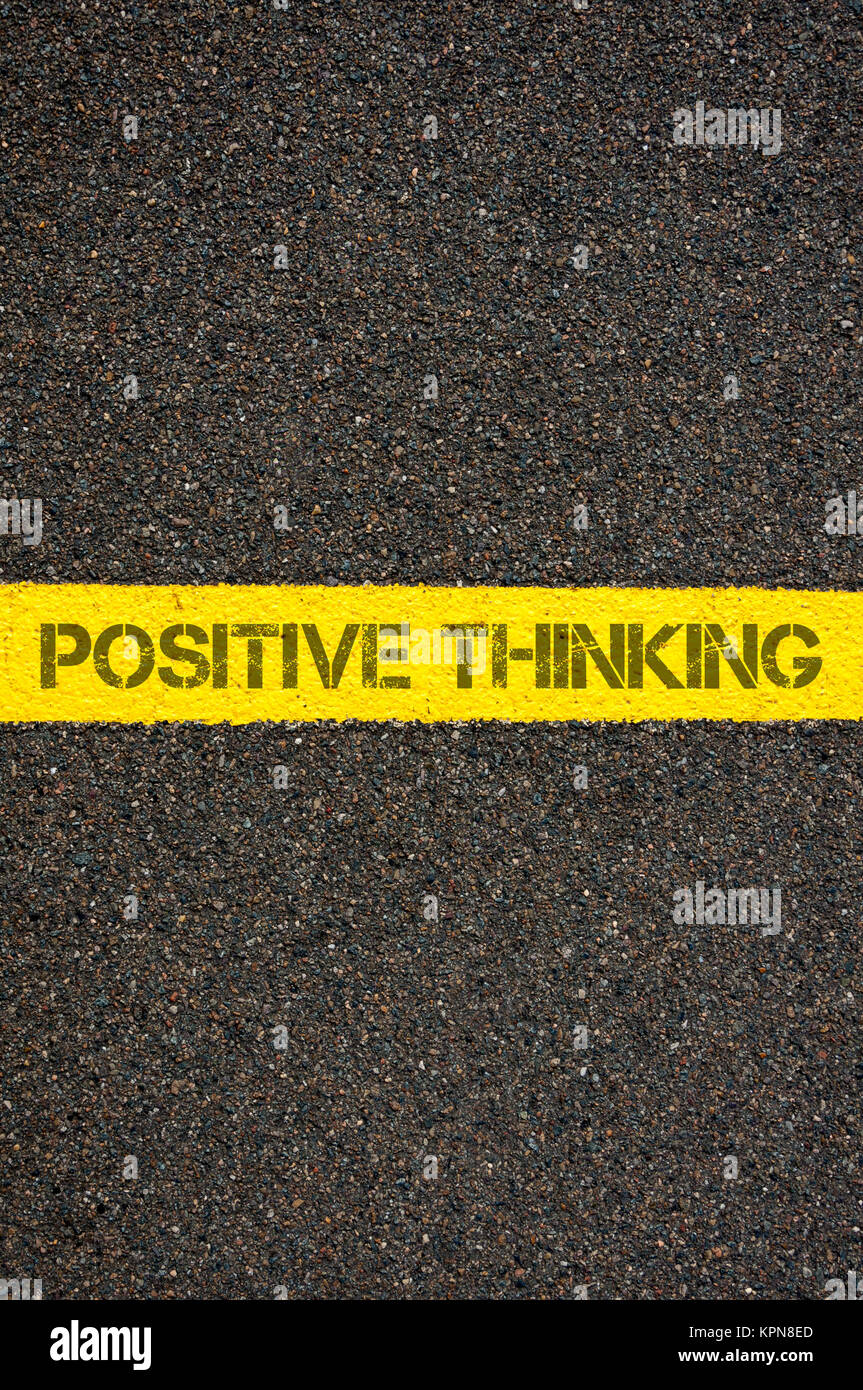 Road marking yellow line with words POSITIVE THINKING Stock Photo - Alamy