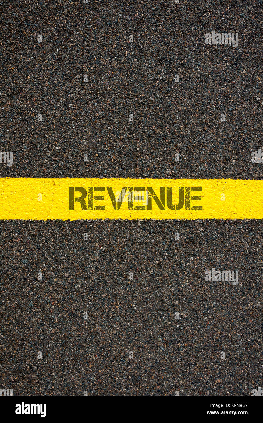 Road marking yellow line with word REVENUE Stock Photo - Alamy