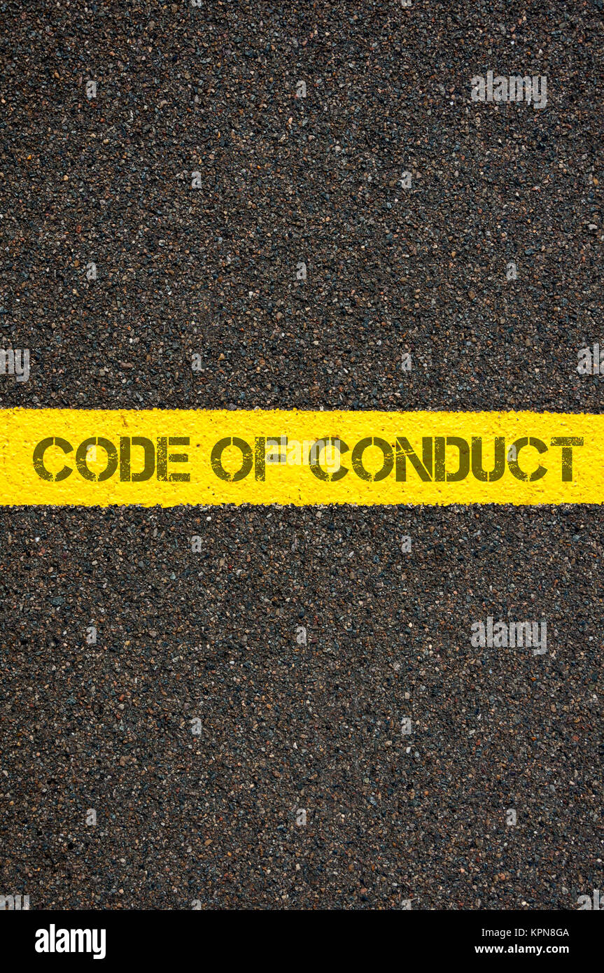 Road marking yellow line with words CODE OF CONDUCT Stock Photo - Alamy