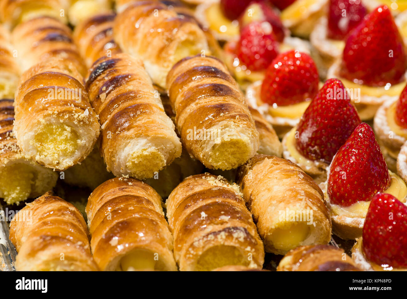puff pastries stuffed with cream Stock Photo - Alamy