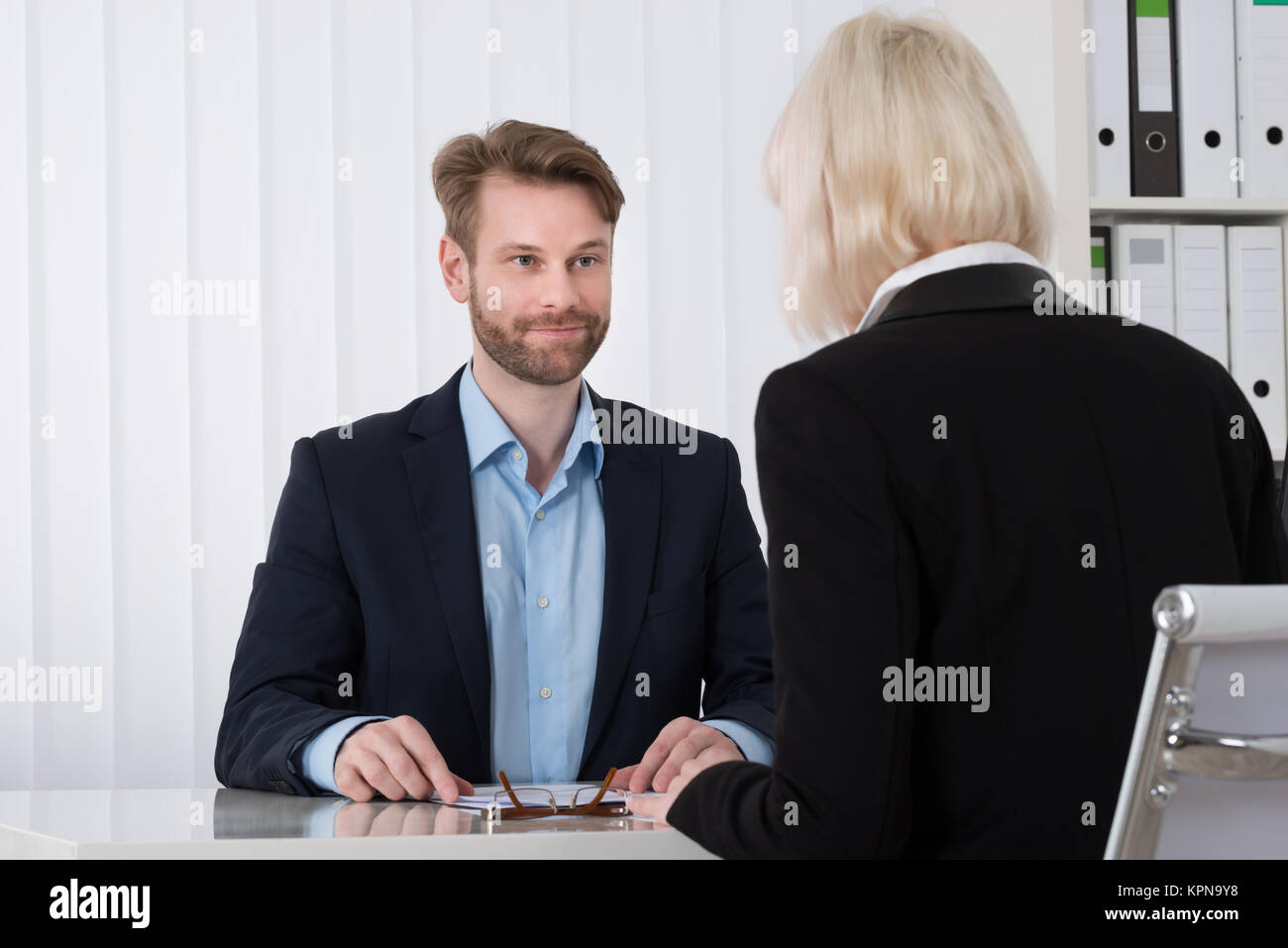 Two Businesspeople Having Conversation Stock Photo - Alamy Two Businesspeople Having Conversation Stock Photo - Alamy