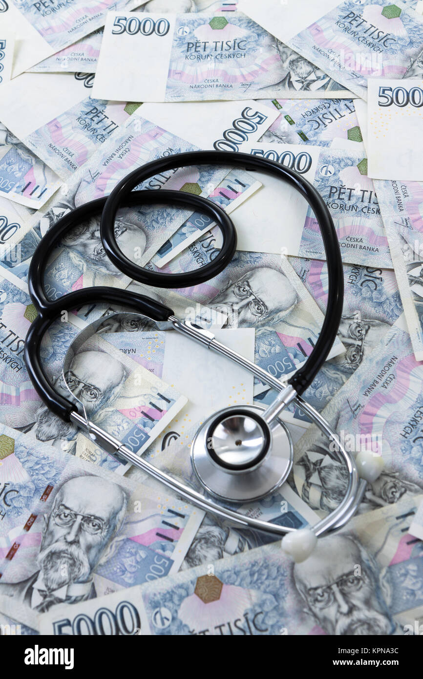 Czech paper money with stethoscope on white background Stock Photo - Alamy
