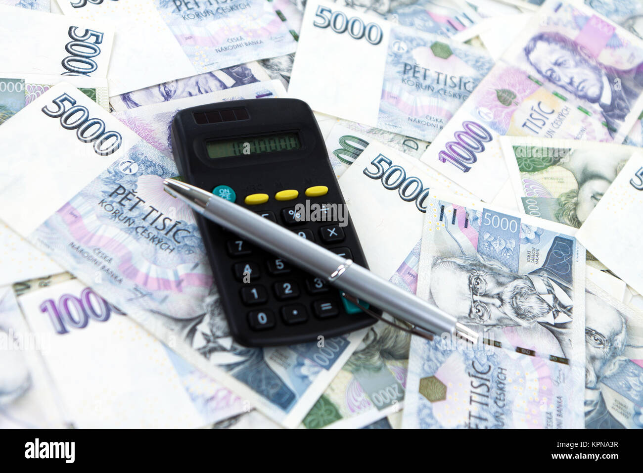 Czech paper money and accounting on white background Stock Photo - Alamy