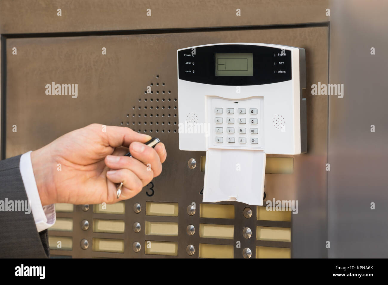 Businessperson Hand Operating Security System Stock Photo - Alamy
