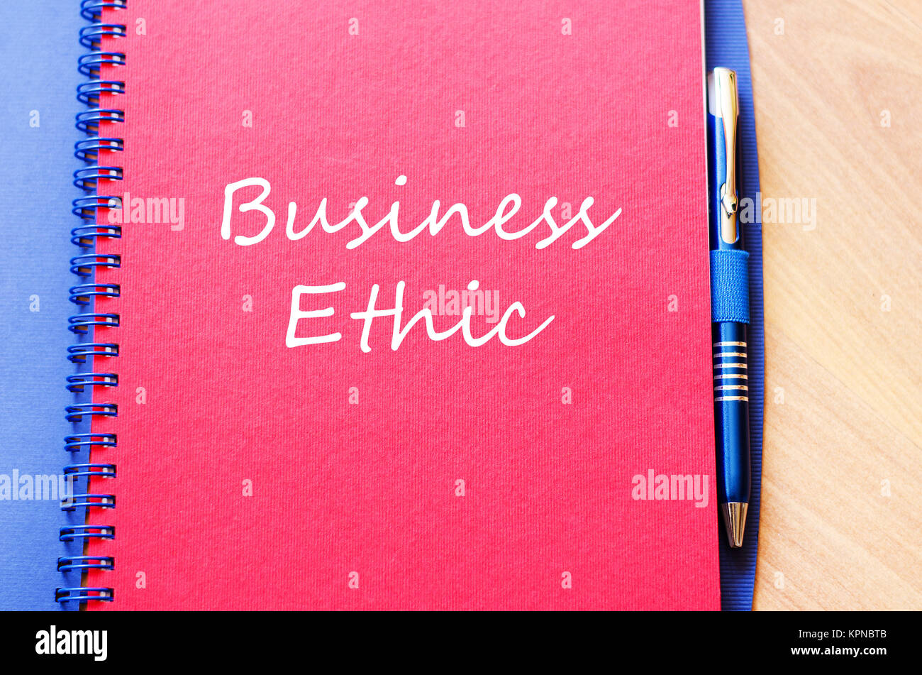 Business ethic write on notebook Stock Photo - Alamy