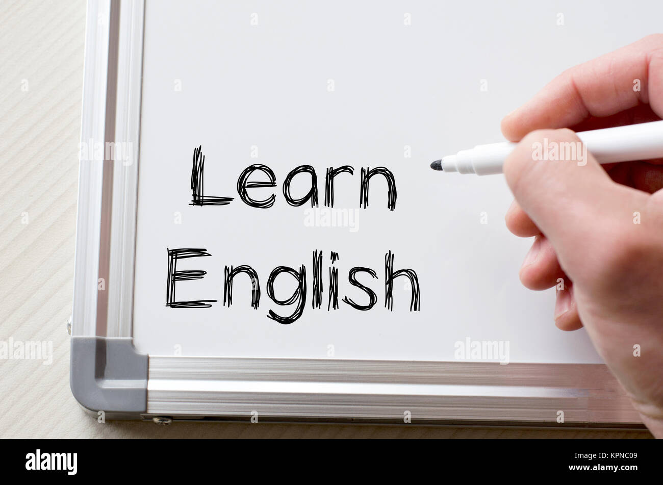 Learn english written on whiteboard Stock Photo - Alamy