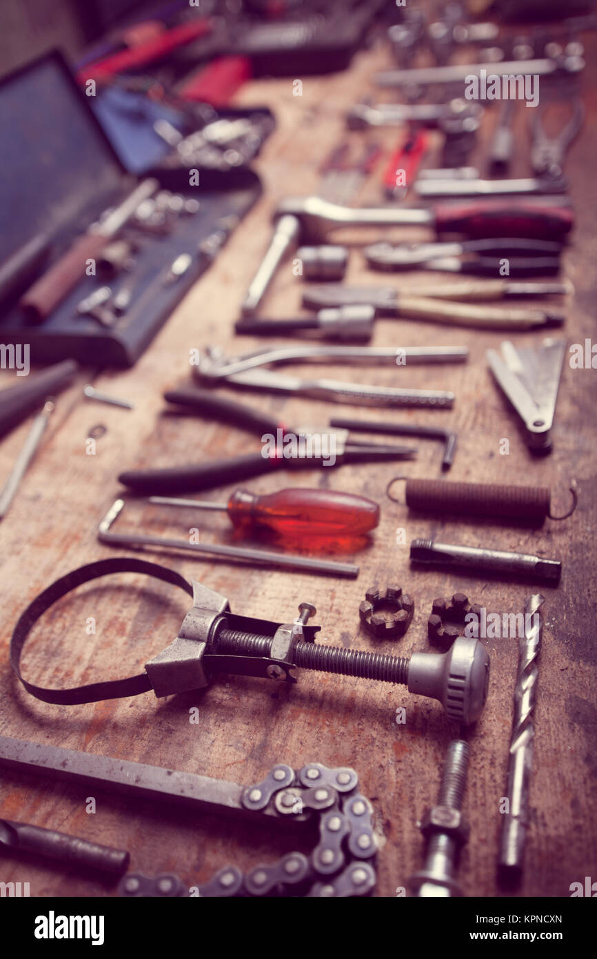 Tools on wooden plank Stock Photo - Alamy