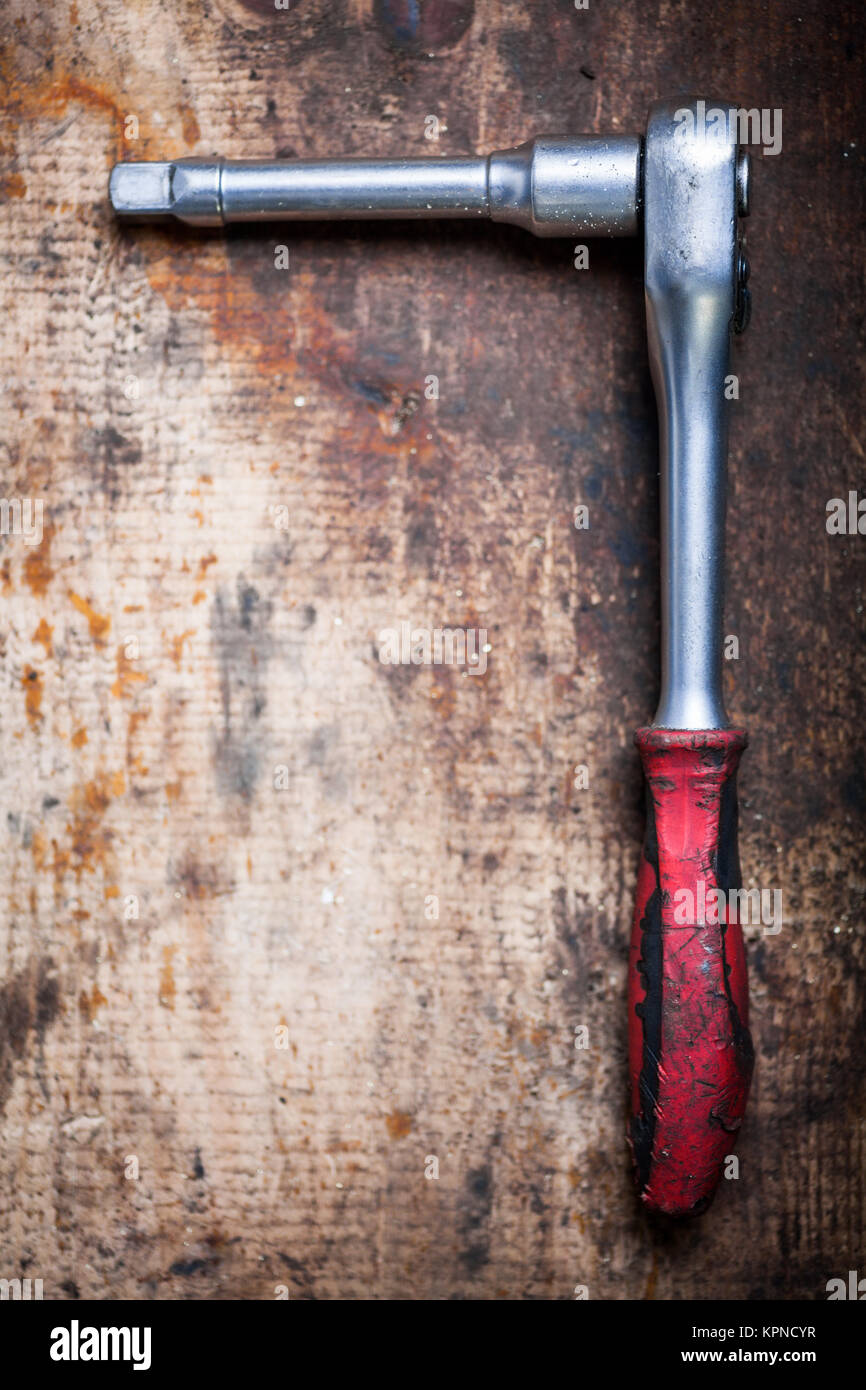 Socket spanner on wooden plank Stock Photo - Alamy