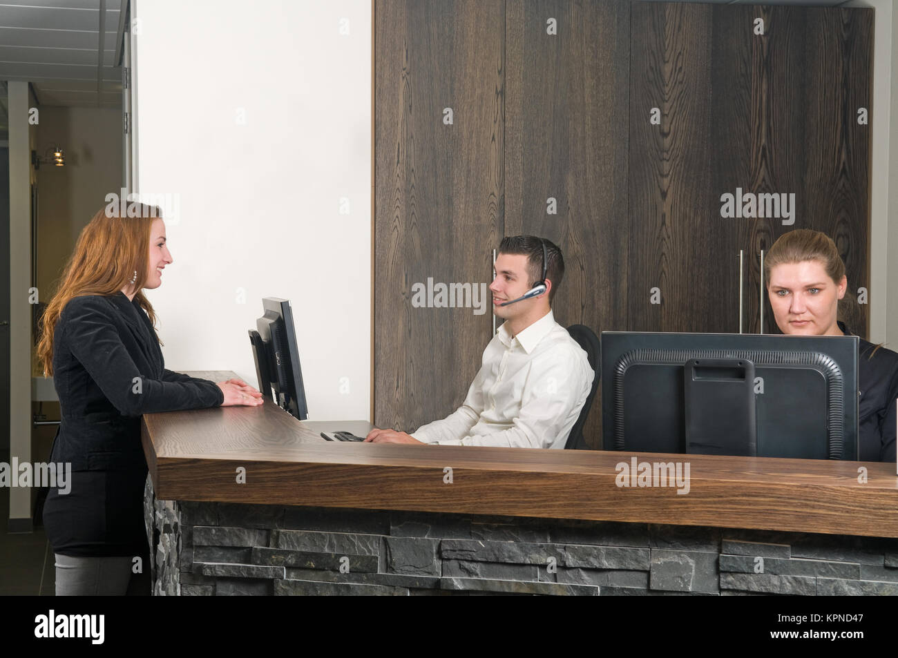 Customer at a service desk Stock Photo - Alamy