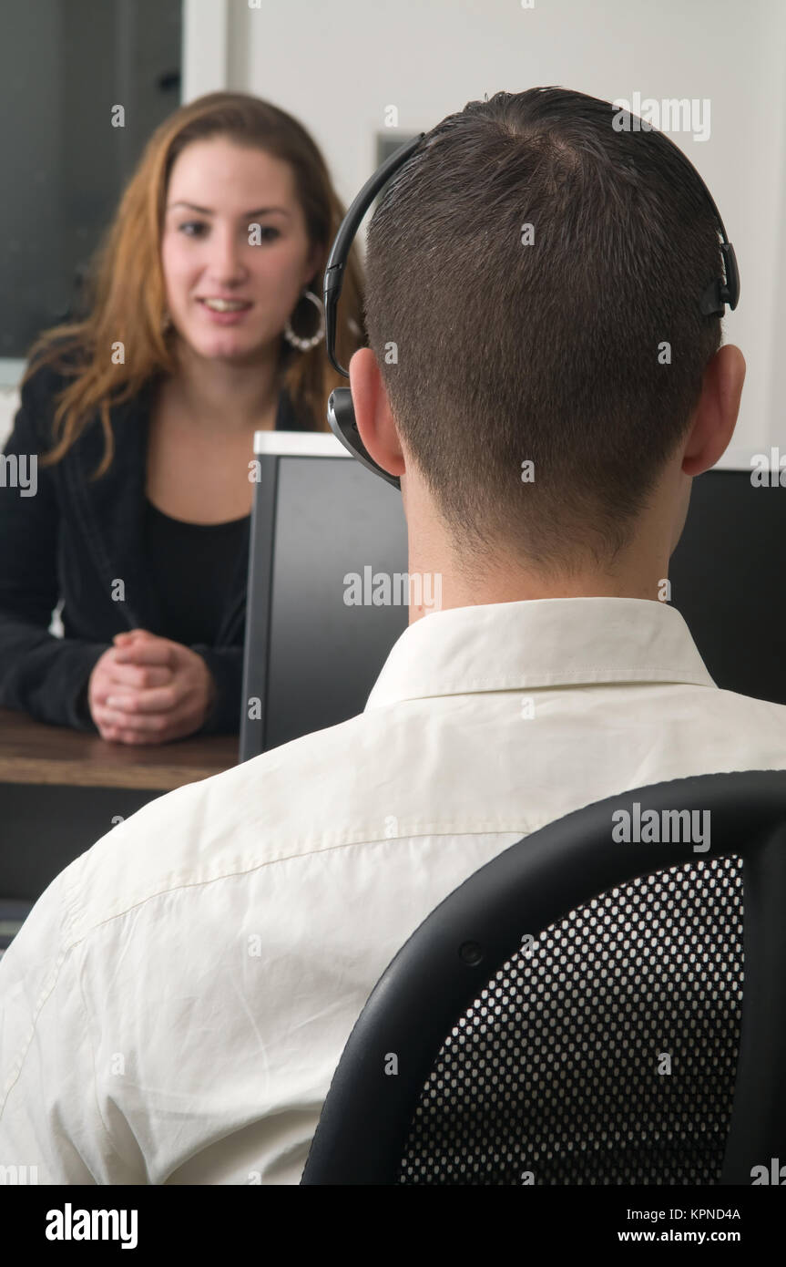 Customer at a service desk Stock Photo - Alamy