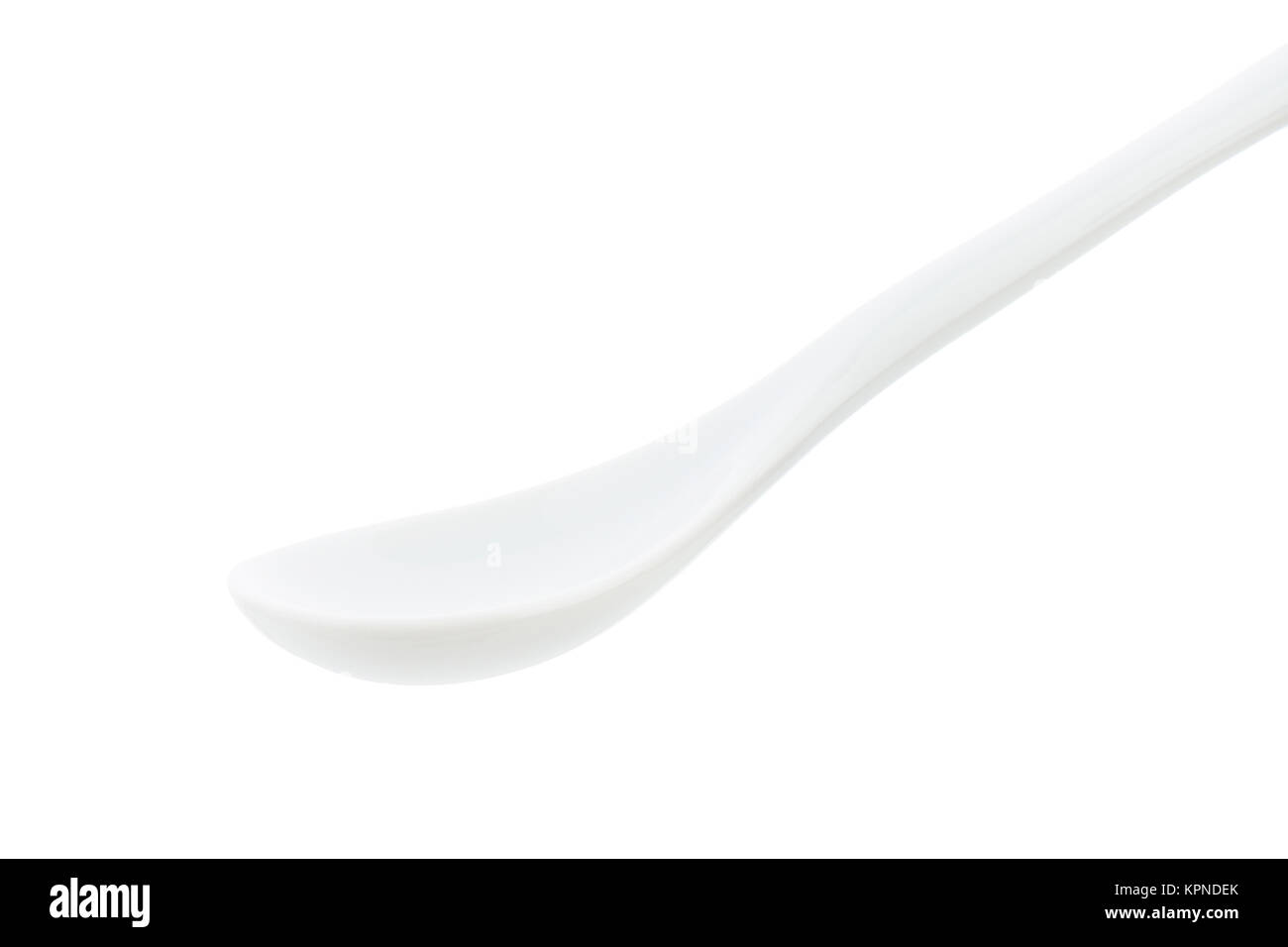 White porcelain spoon Stock Photo - Alamy