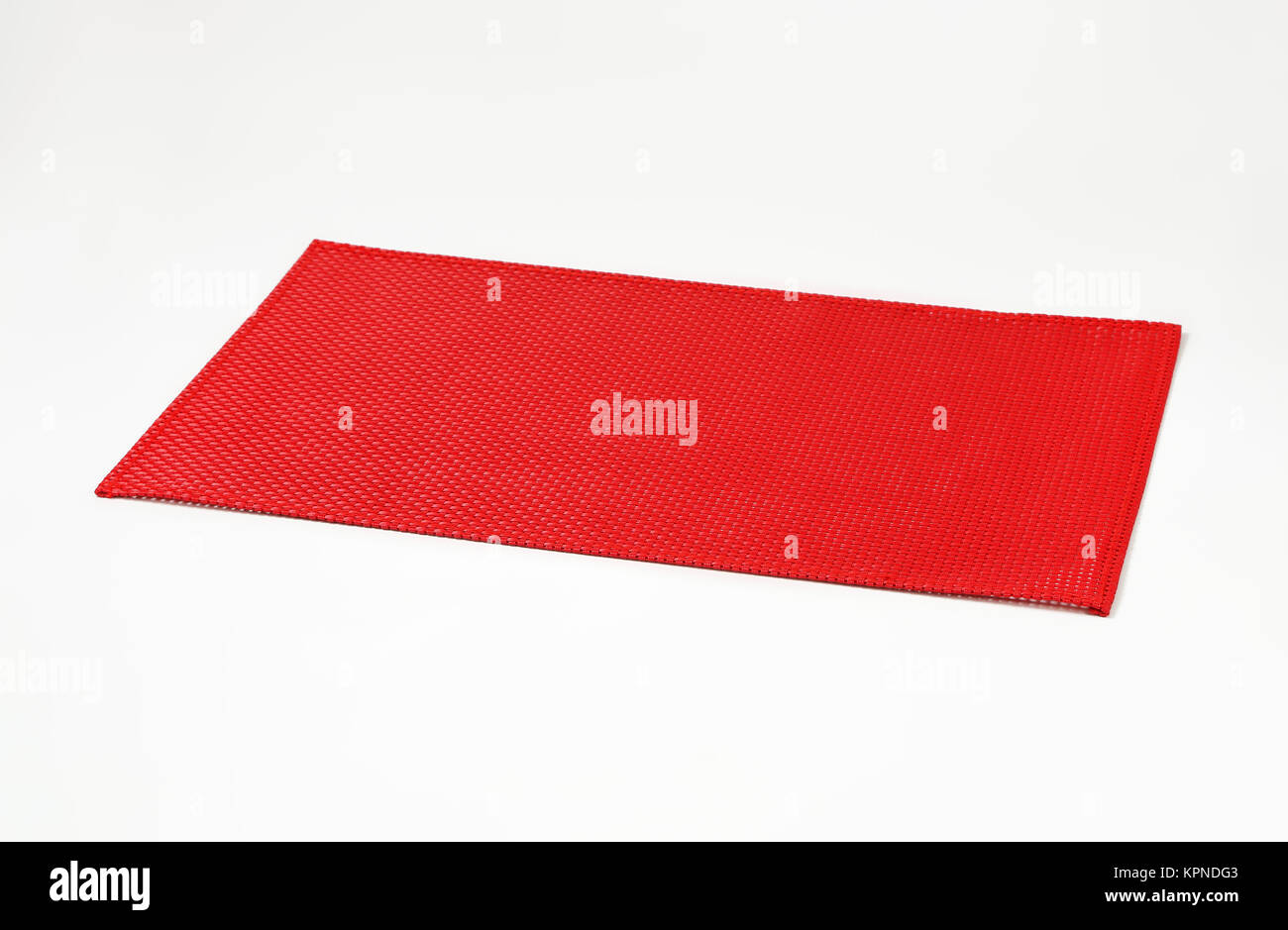 Red plastic placemat Stock Photo - Alamy