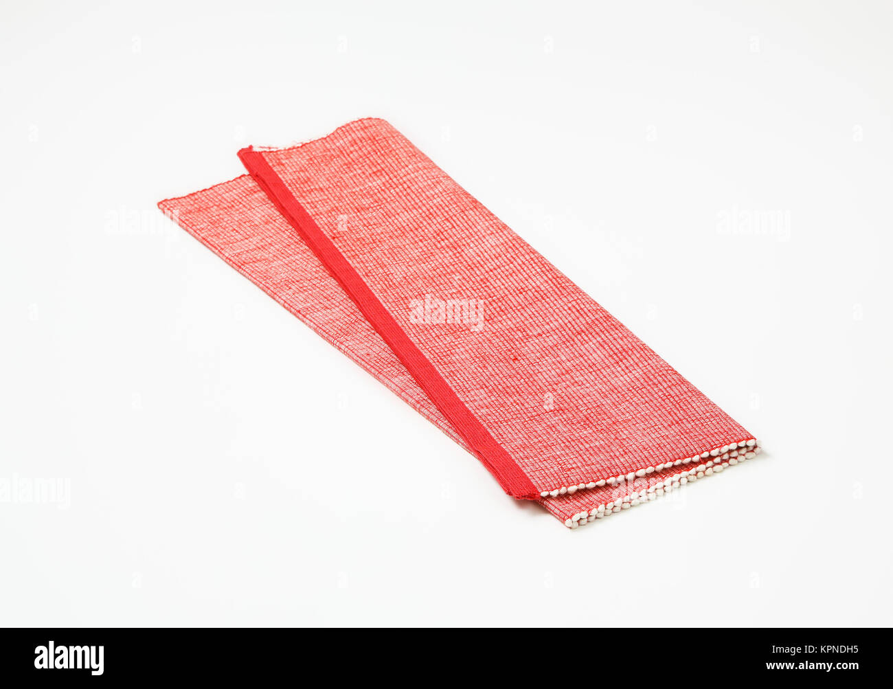 Red cloth table mat Stock Photo - Alamy