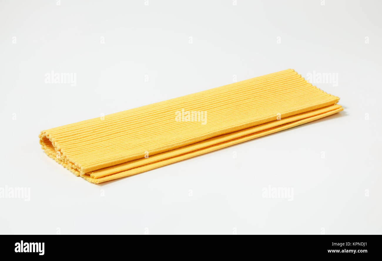 Yellow place mat Stock Photo - Alamy