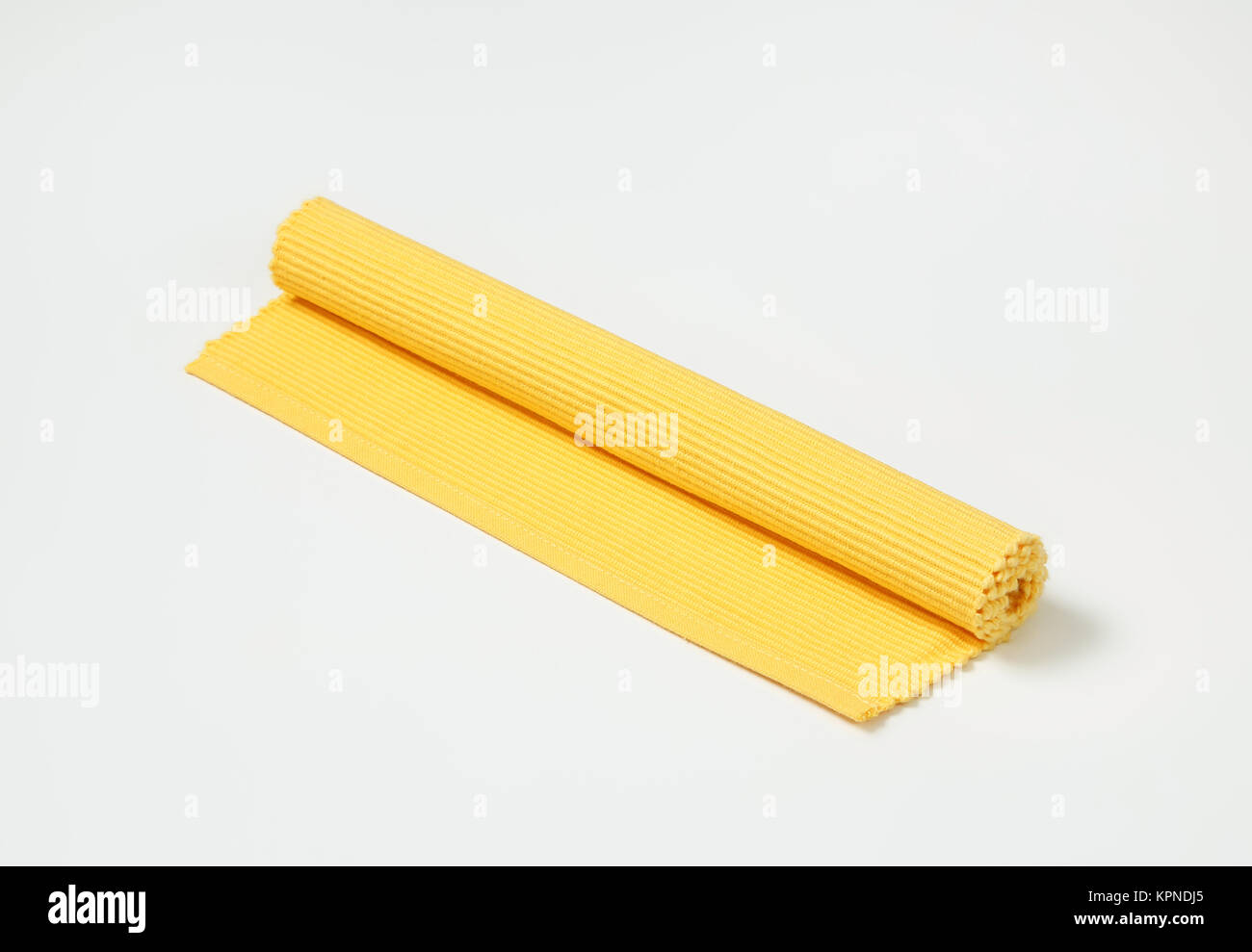 Yellow place mat Stock Photo - Alamy