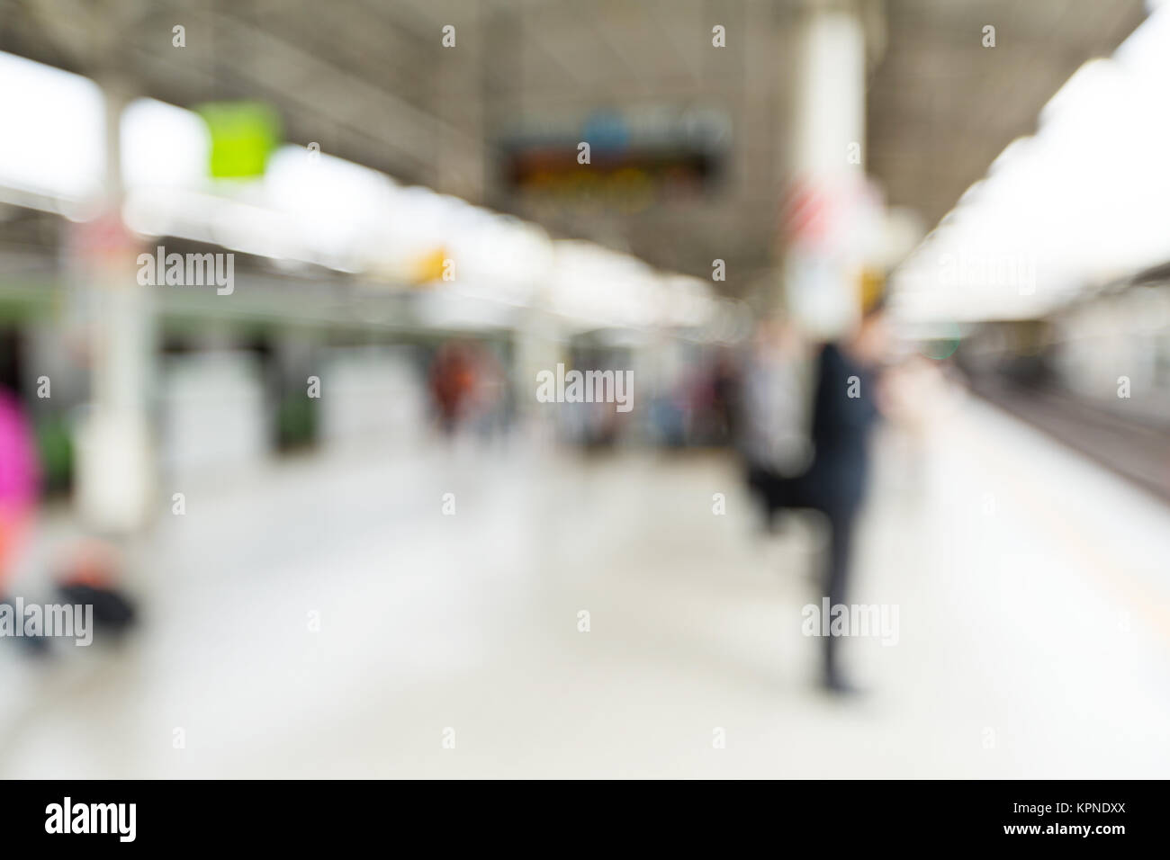 Blurry view of trains station Stock Photo - Alamy