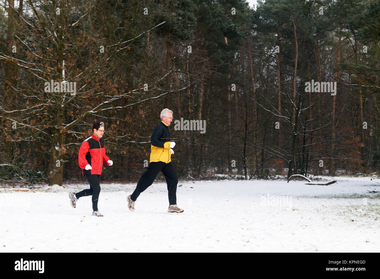 Running In The Snow Stock Photo - Alamy