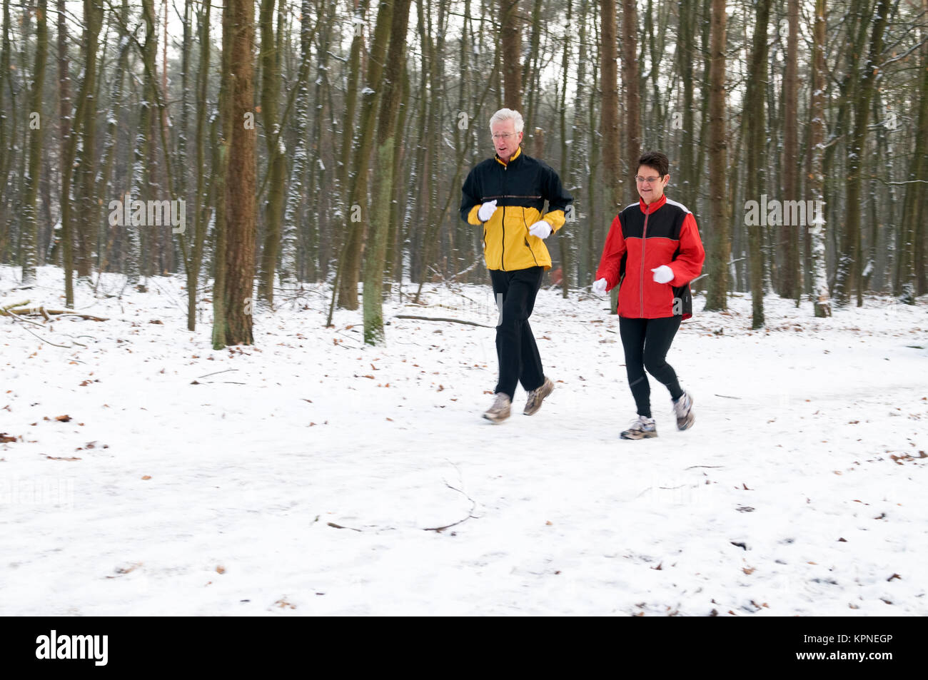 Running In The Snow Stock Photo - Alamy