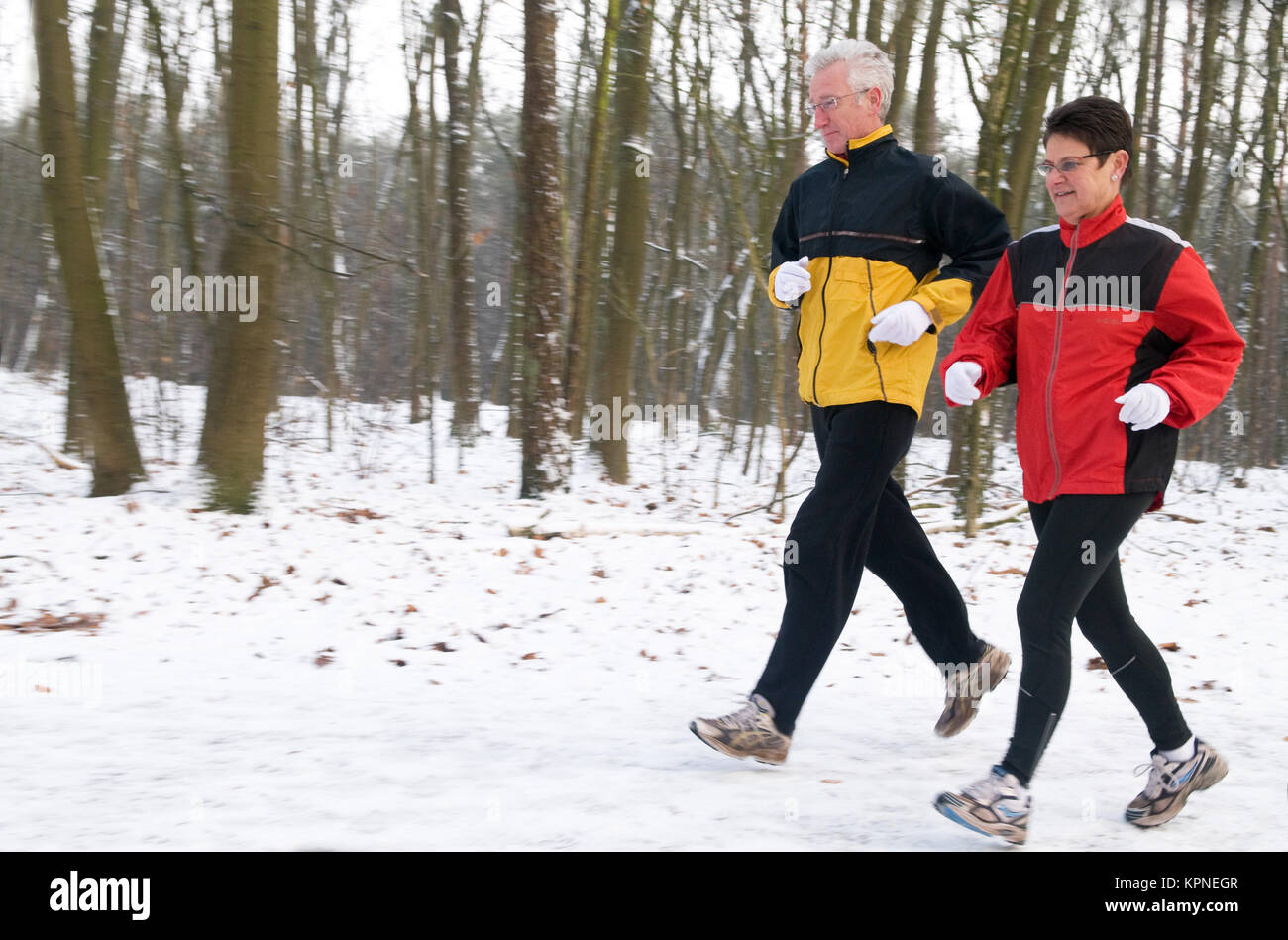 Running In The Snow Stock Photo - Alamy