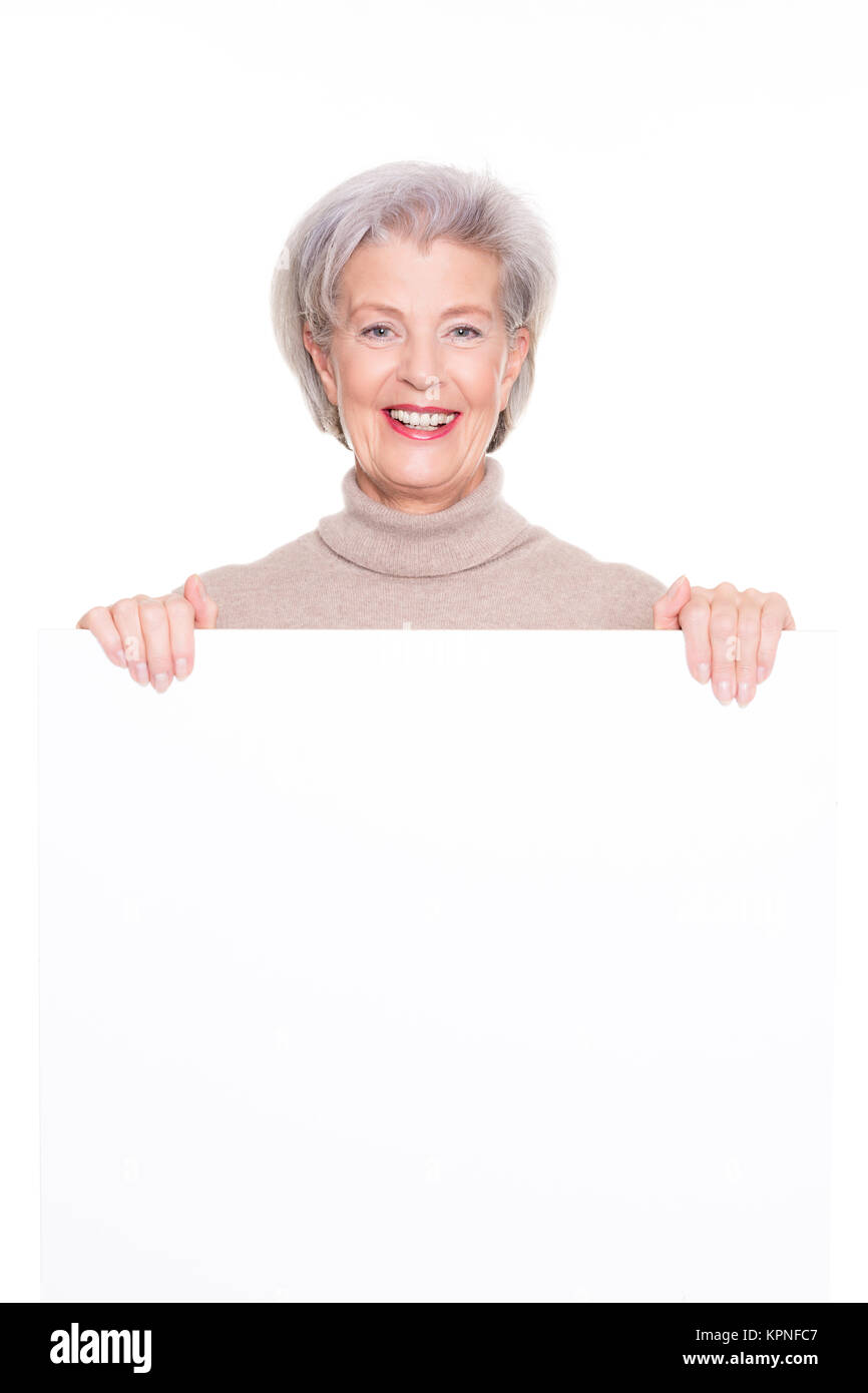 elderly woman with advertising sign Stock Photo - Alamy