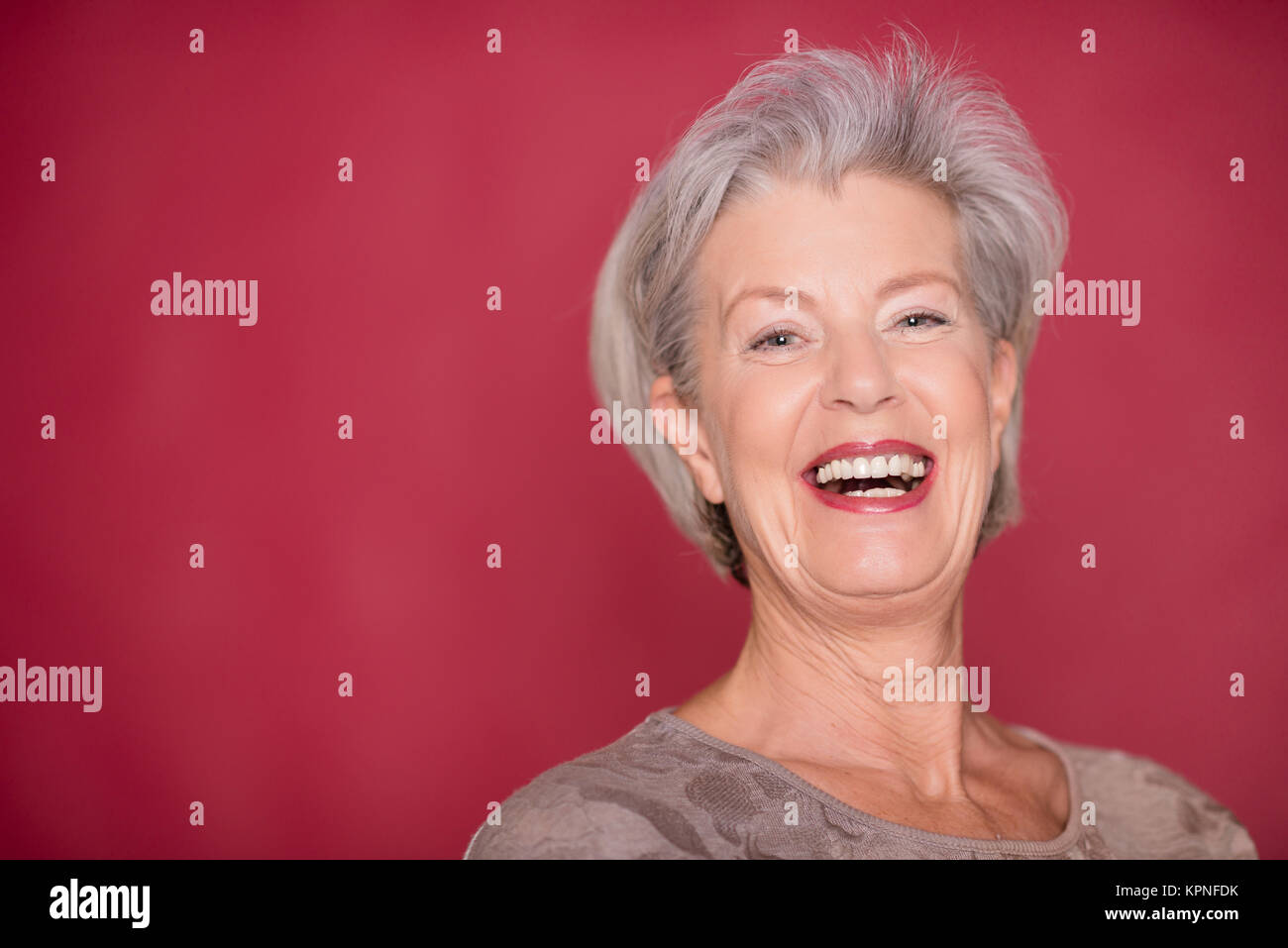 studio portrait against red background Stock Photo - Alamy