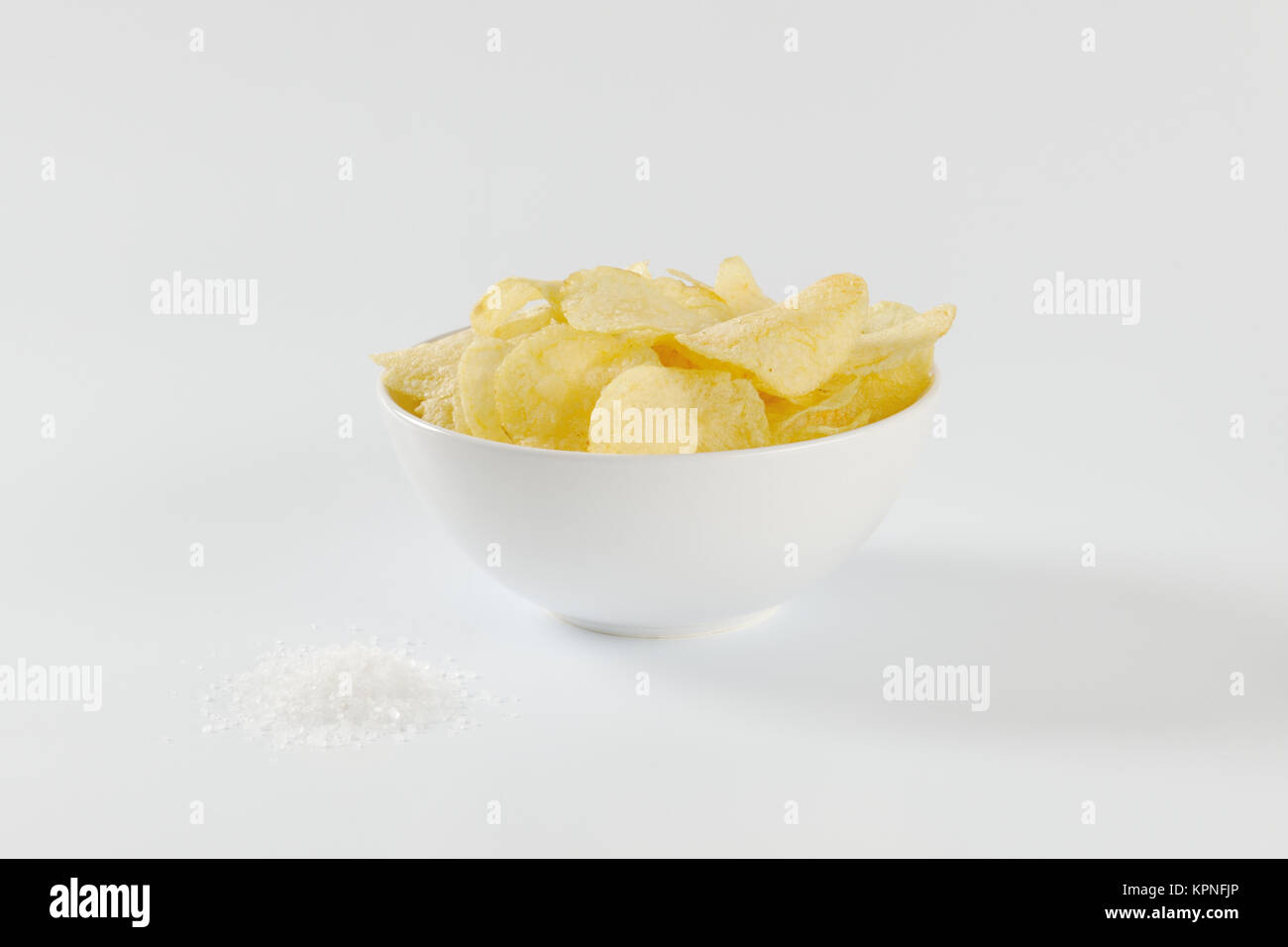 Salted potato chips Stock Photo - Alamy