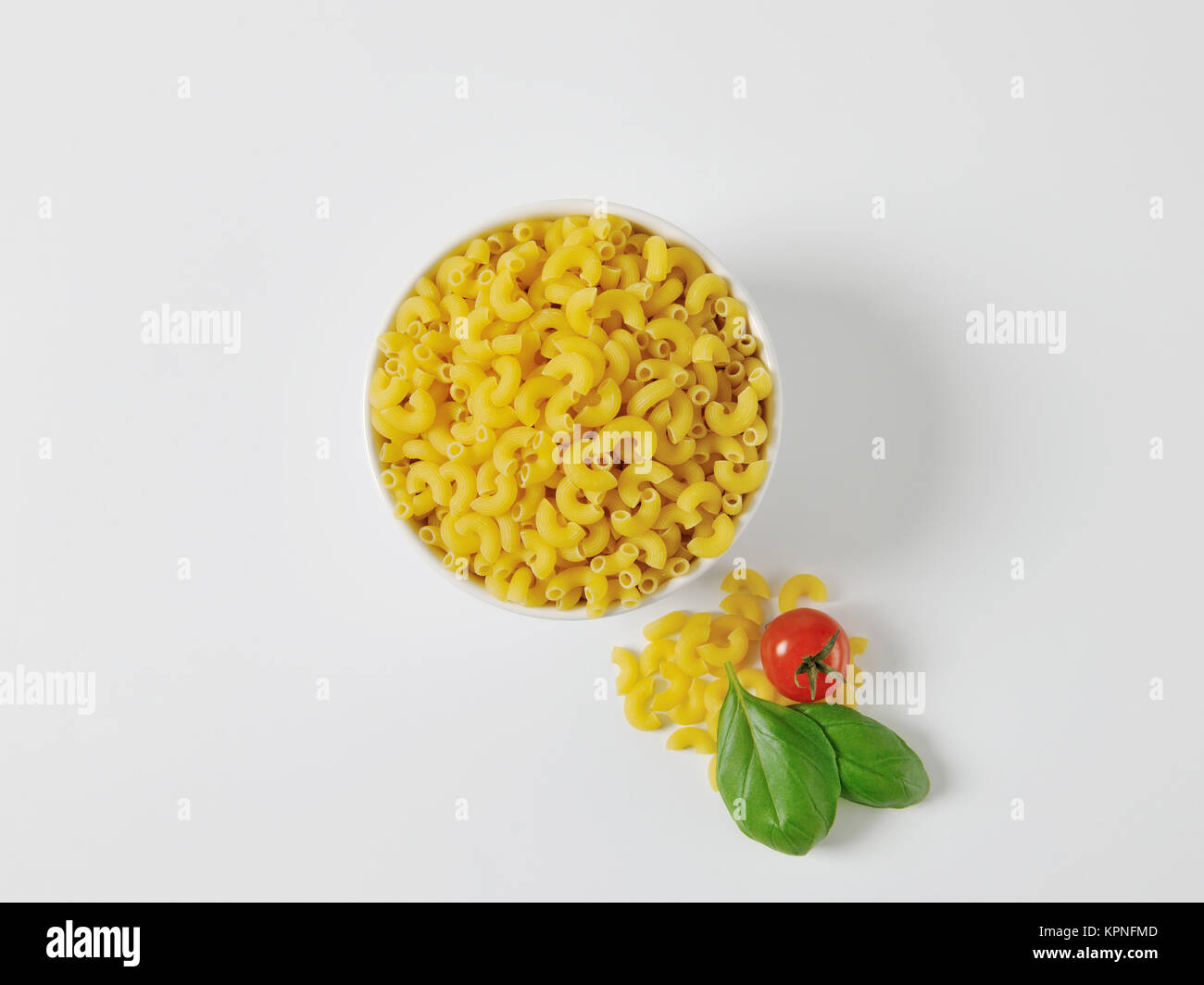 Bowl of dried macaroni Stock Photo - Alamy