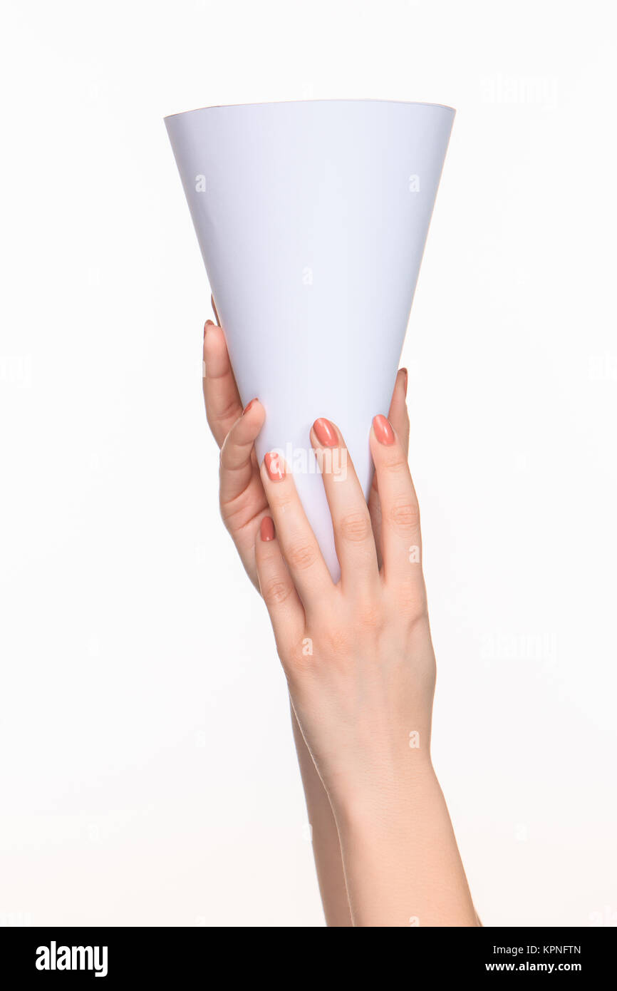 The cone in female hands on white background Stock Photo - Alamy