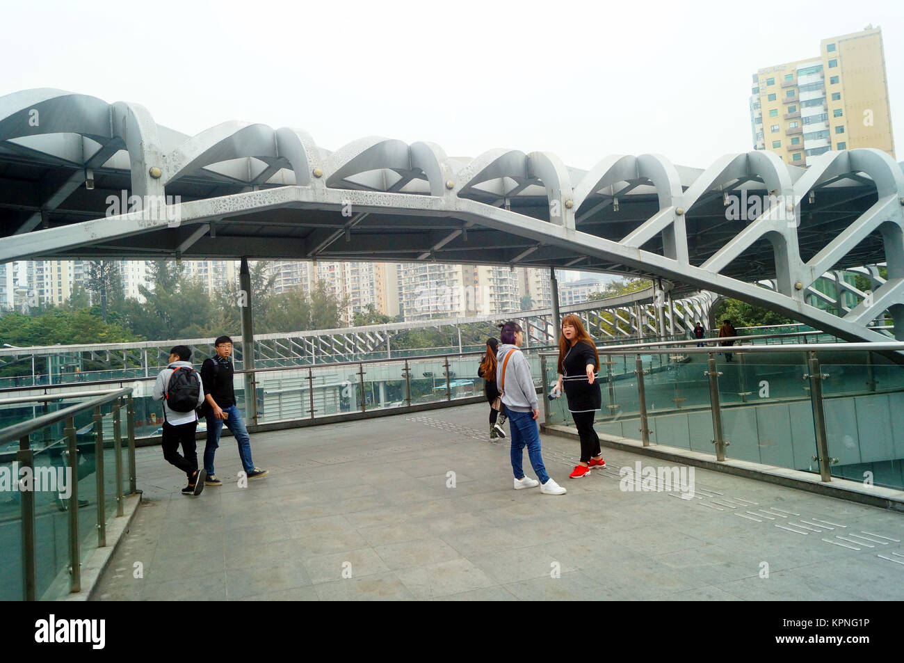 Pedestrian bridge architectural landscape, and pedestrians tourists ...