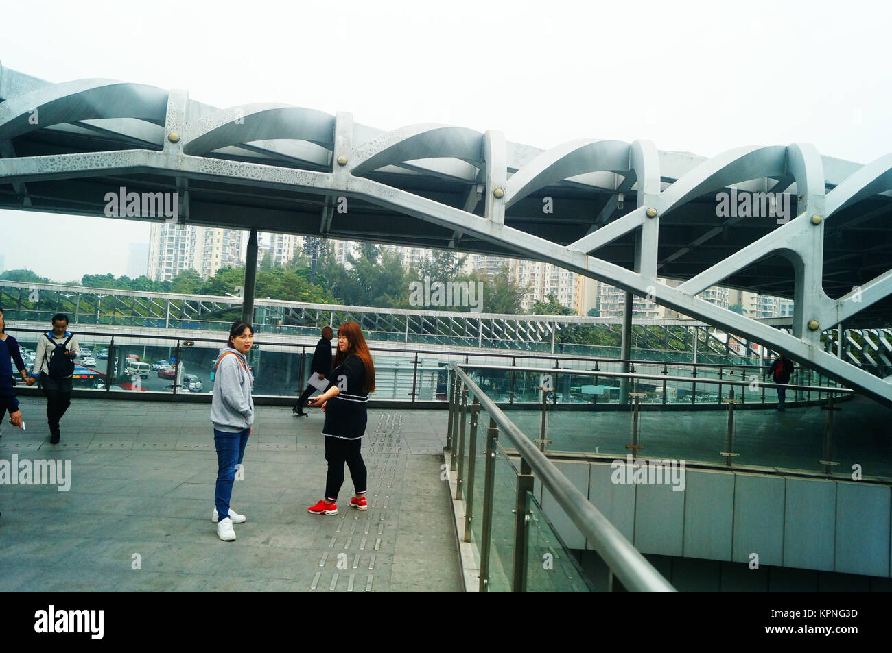 Pedestrian bridge architectural landscape, and pedestrians tourists ...
