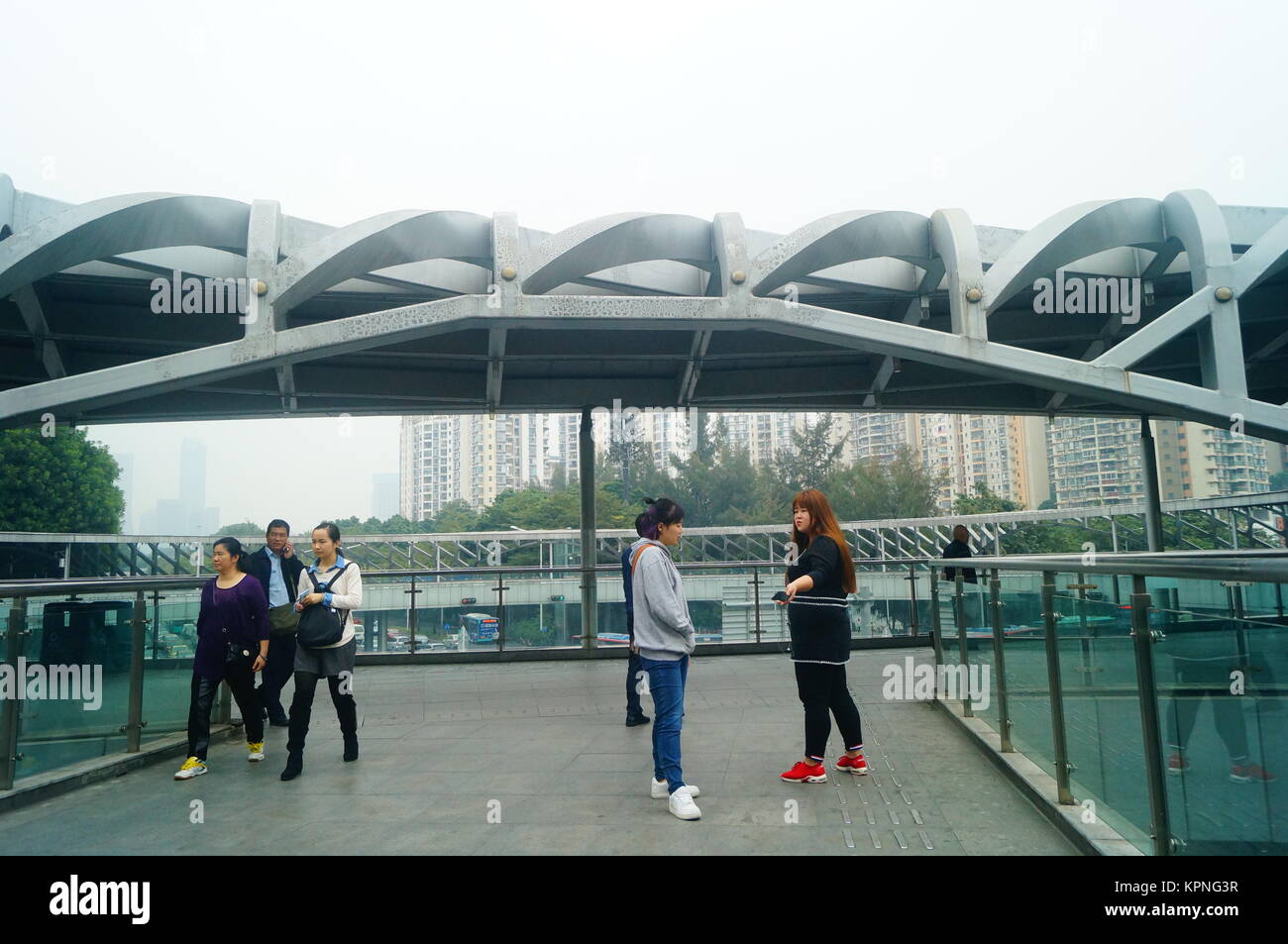 Pedestrian bridge architectural landscape, and pedestrians tourists ...