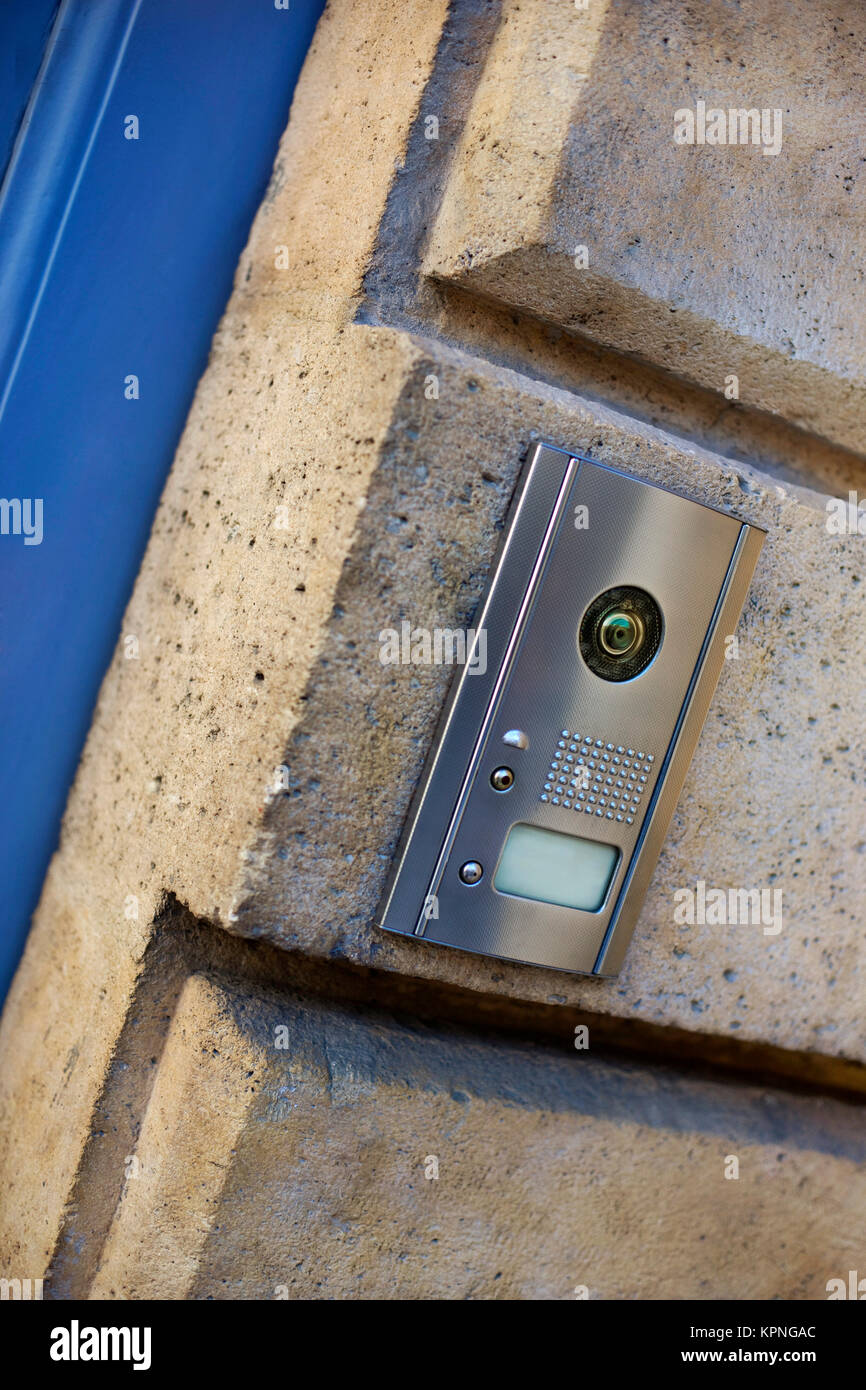 Intercom on a stone wall Stock Photo - Alamy