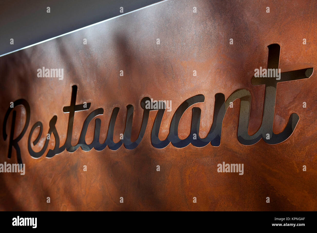 Metallic sign for a restaurant Stock Photo - Alamy