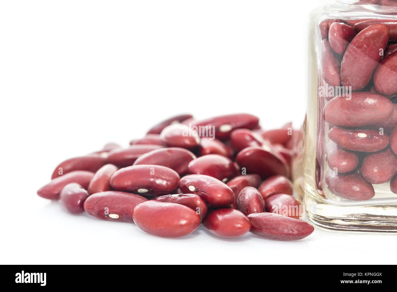 Bottle full of Kidney beans white background Stock Photo - Alamy