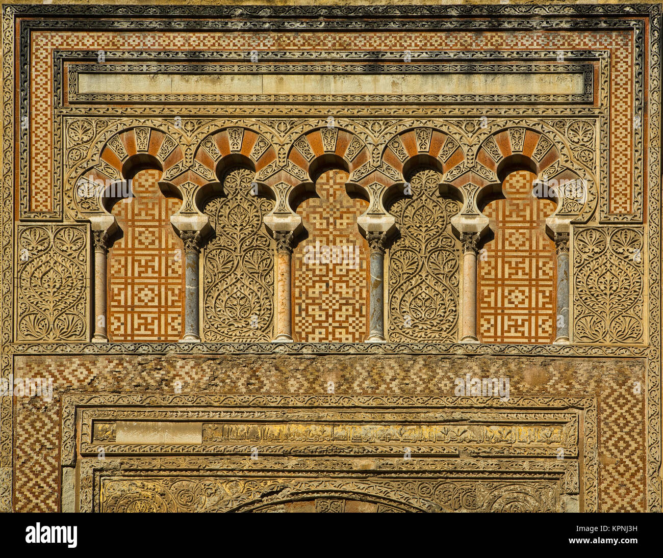 Lobulated archs outside the mosque Stock Photo - Alamy