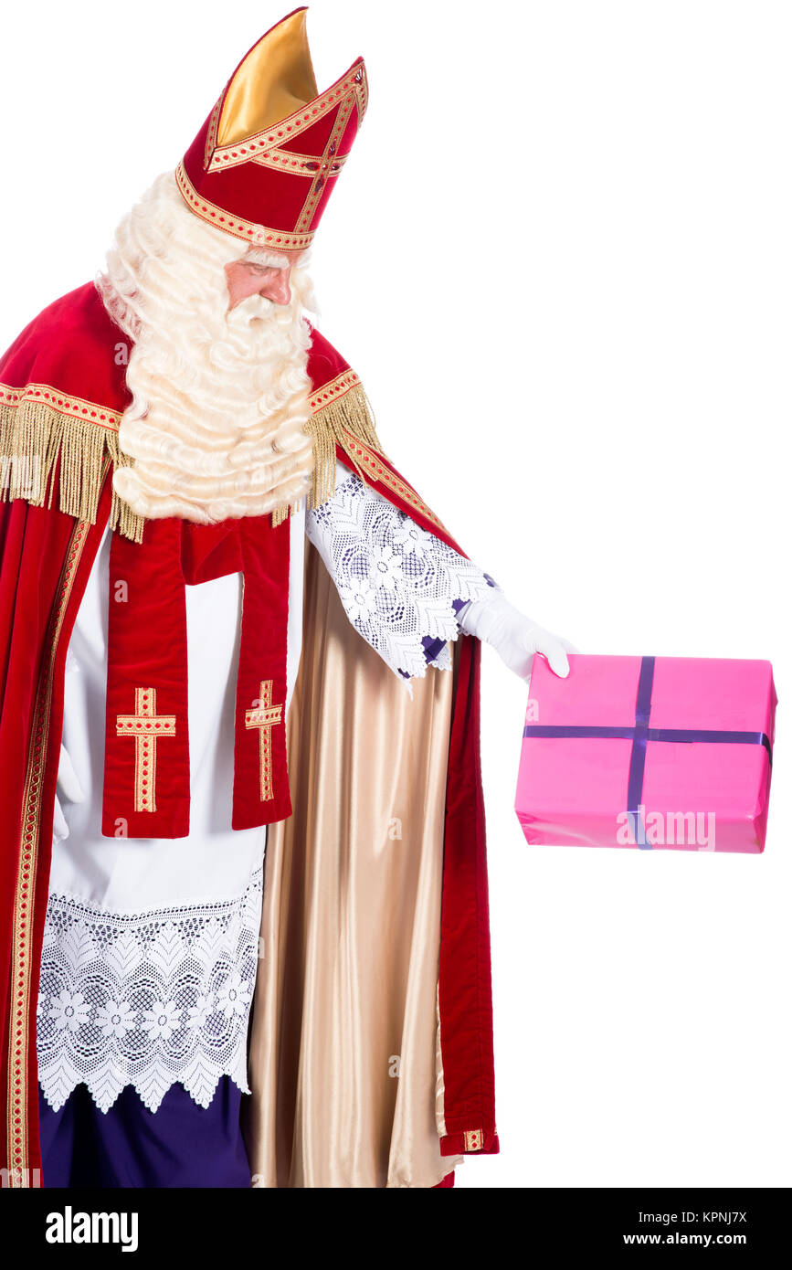 Sinterklaas is giving a present Stock Photo - Alamy