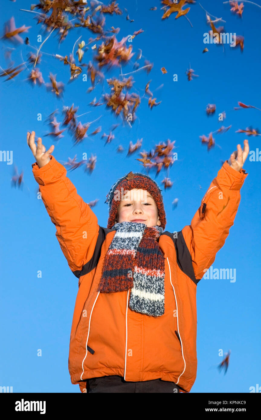 Catching The Autumn Leaves Stock Photo - Alamy