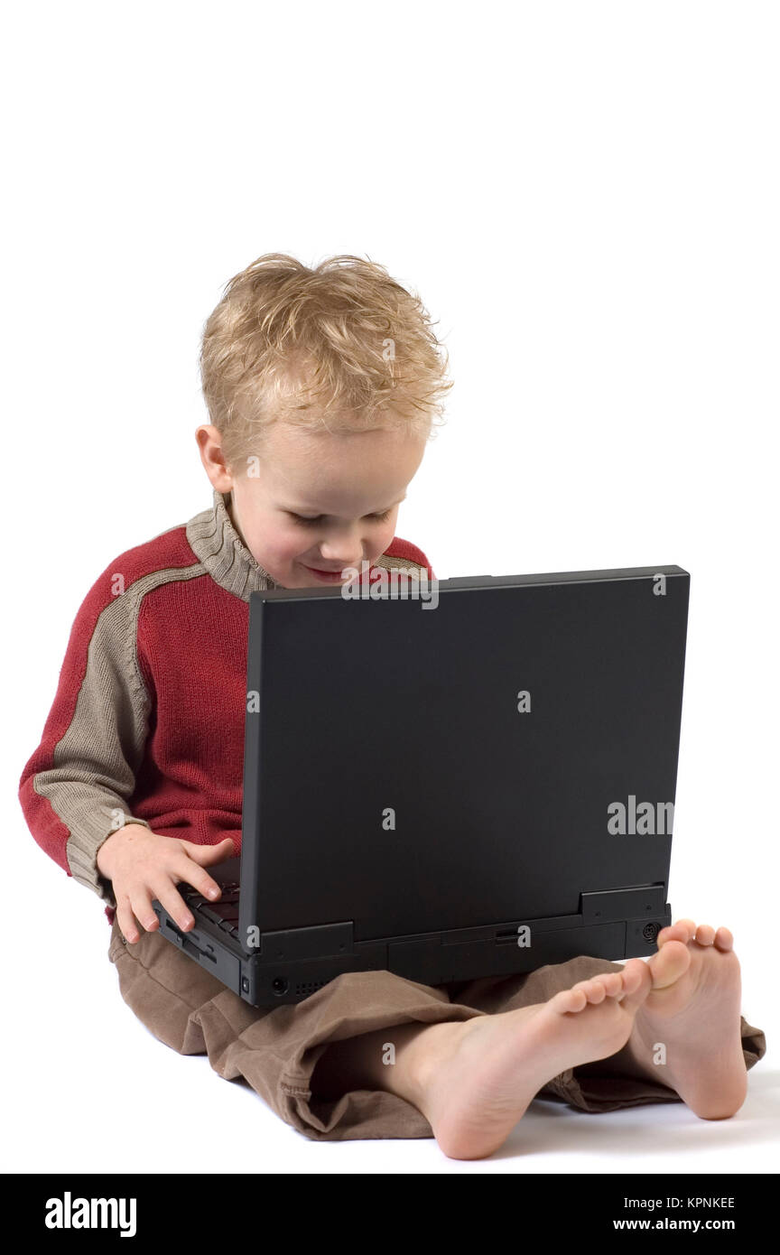 Boy working on a laptop 2 Stock Photo - Alamy