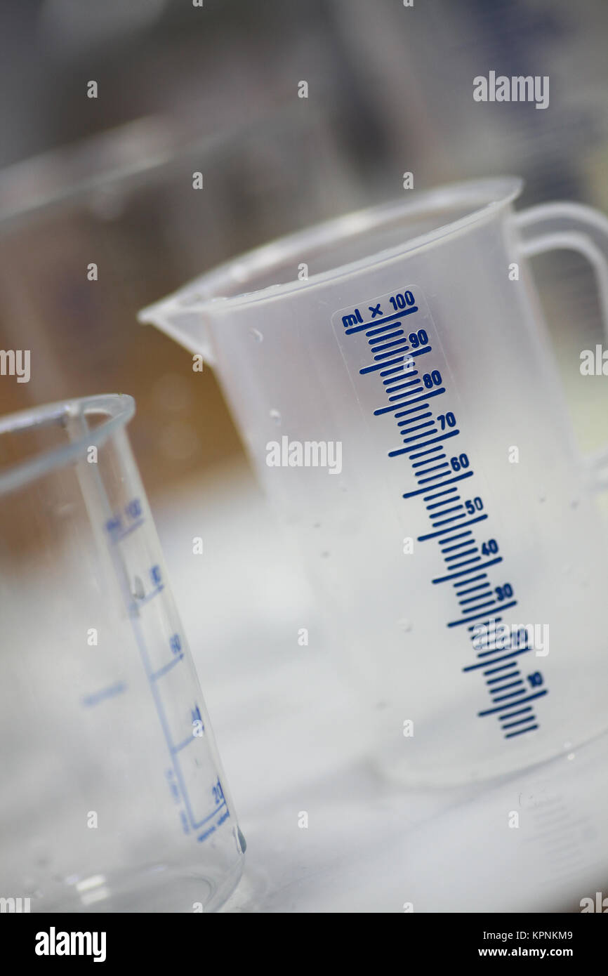 Recipients in chemistry lab Stock Photo - Alamy