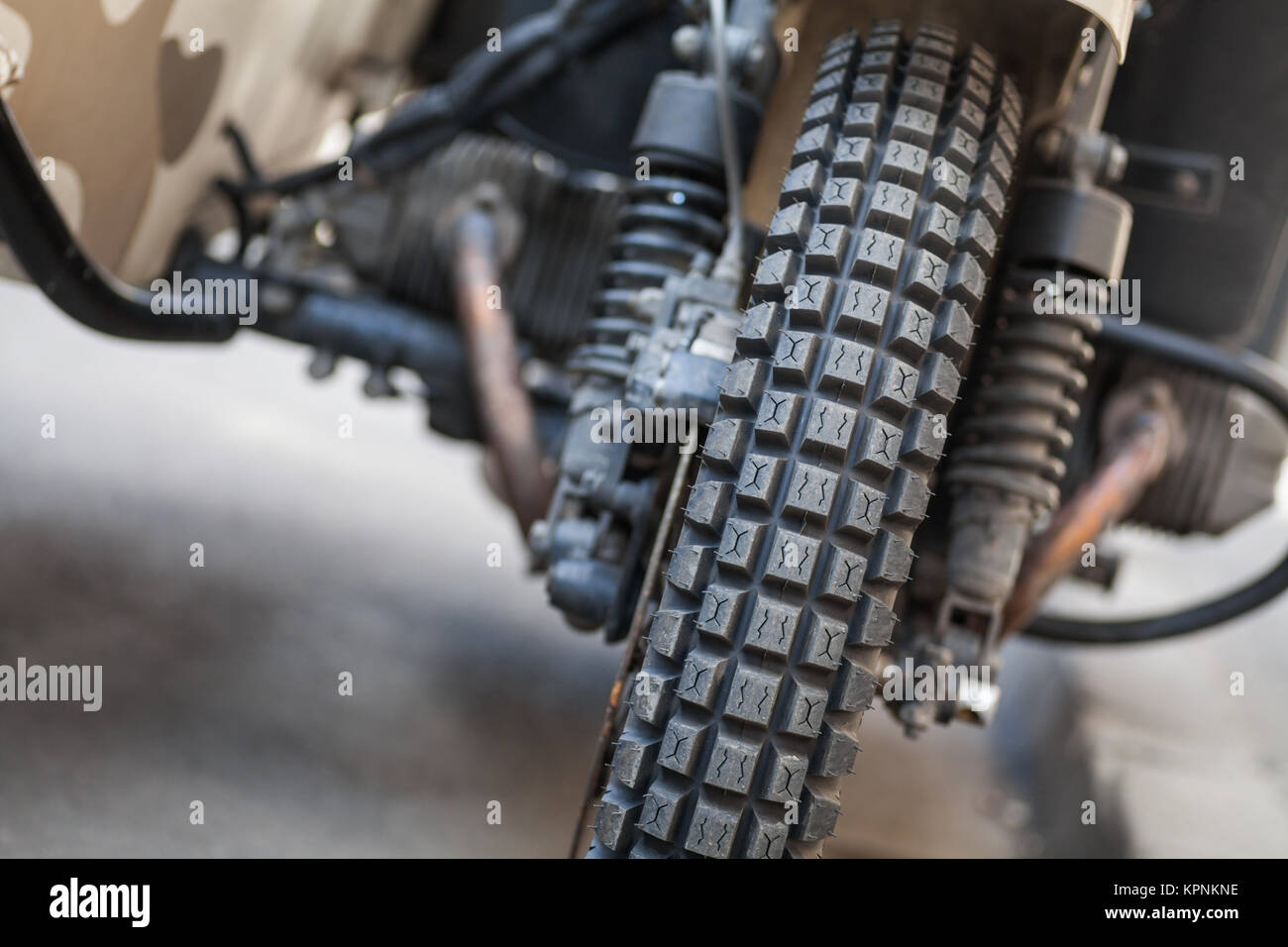Trial motorcycle knobby tire Stock Photo - Alamy