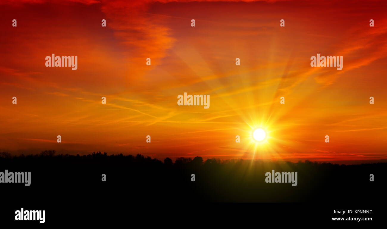 Beautiful sunset sky. Sky Background.The setting sun in a cloudy sky ...