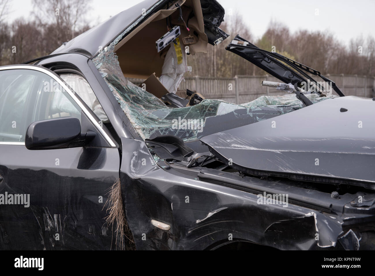 photo showing the heavily crashed car in a road accident Stock Photo ...
