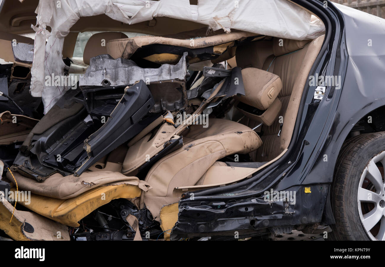 photo showing the heavily crashed car in a road accident Stock Photo ...